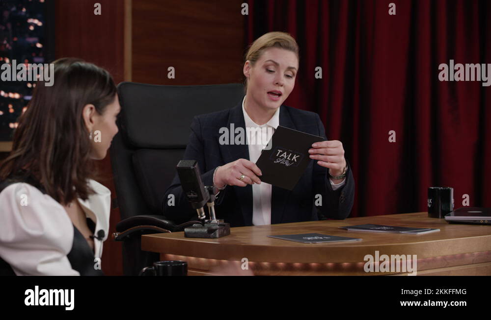 Late-night talk show female host having a conversation with celebrity ...
