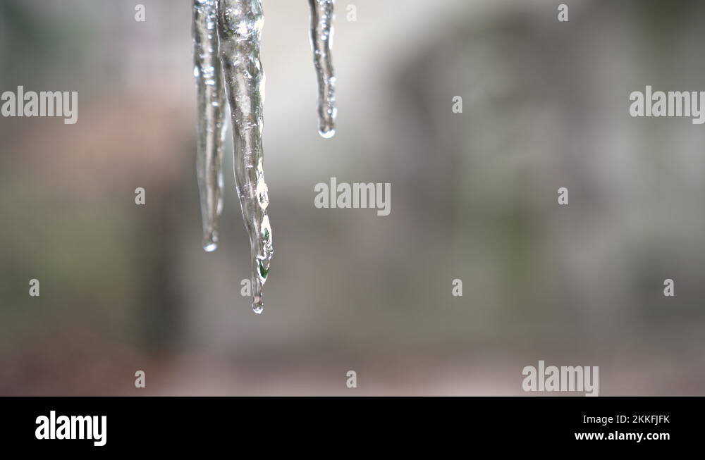 Static Ice melting water drops falling down, with copy space Stock ...