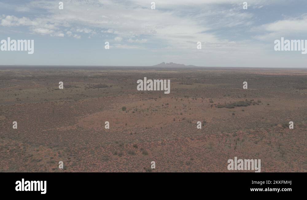 Desolate Red Desert In Uluru-Kata Tjuta National Park. Distant View Of ...