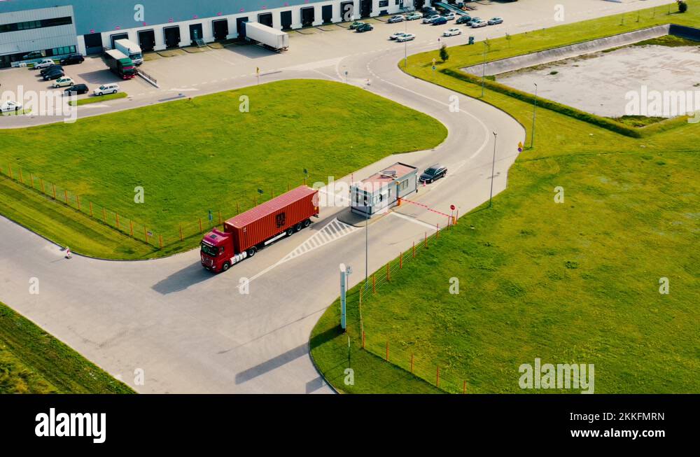 Logistics park with a warehouse - loading hub. Semi-trucks with freight ...