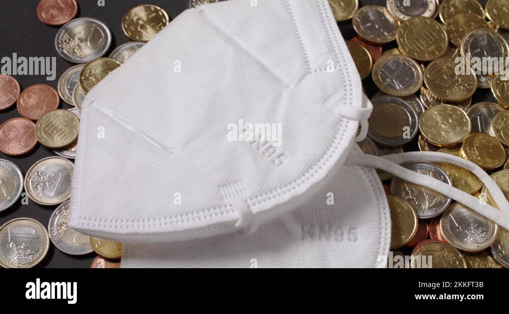 N95, FFp2 Face Mask on top of Euro Coins, Symbol for Economic ...