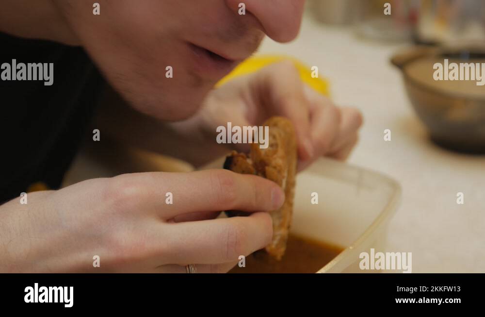 Chicken man eating Stock Videos & Footage - HD and 4K Video Clips - Alamy