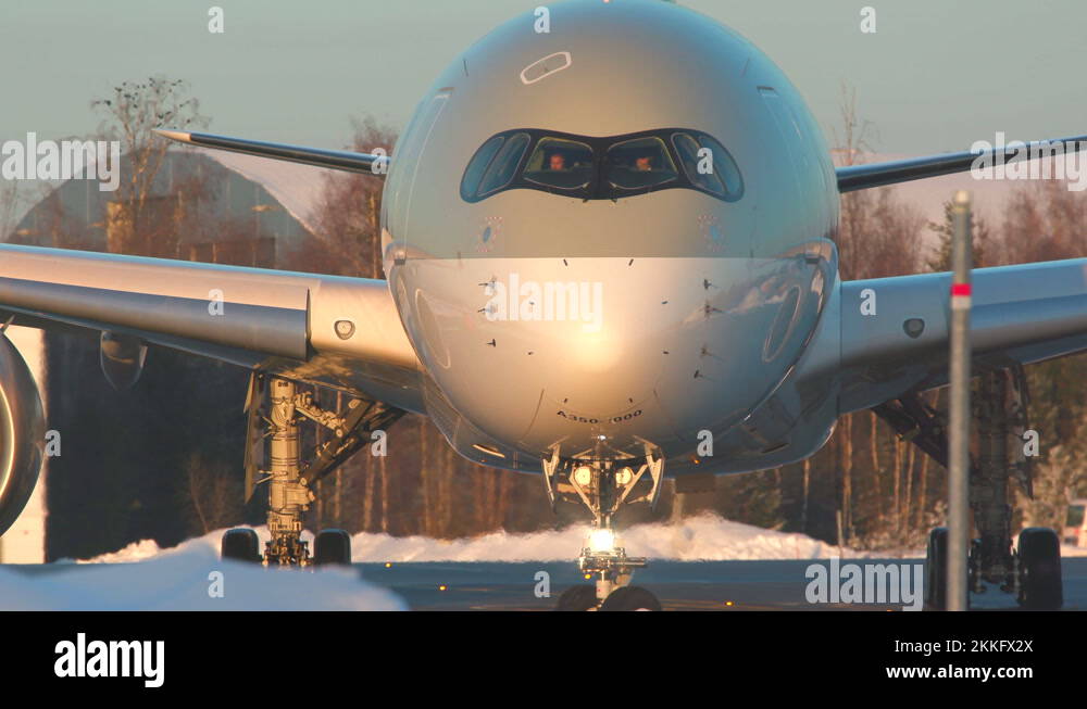 huge passenger airplane qatar airbus a350-1000 taxiing front view ...