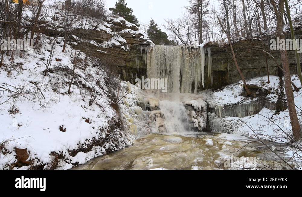 Winter waterfall over limestone rock Stock Video Footage - Alamy
