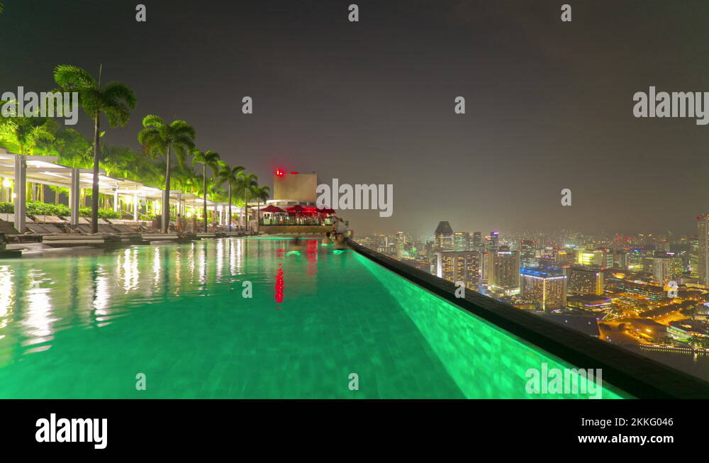 night singapore famous hotel rooftop swimming pool panorama 4k ...