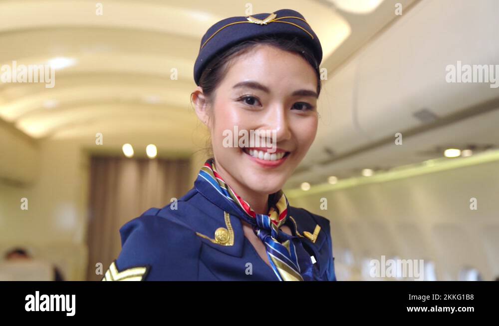 Cabin crew or air hostess working in airplane Stock Video Footage - Alamy