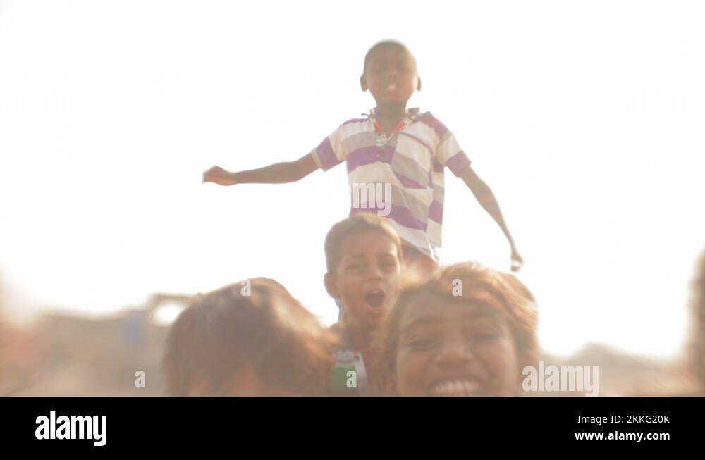 Portrait of an Indian children playing together and screaming, Mumbai ...