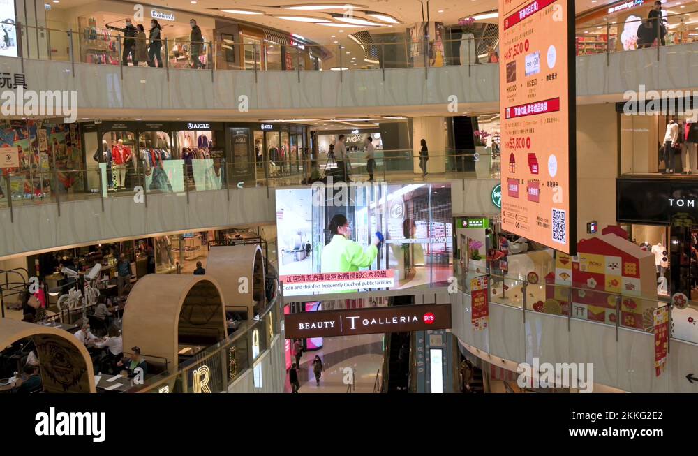 A large-size screen at a shopping mall displays a video showing ...