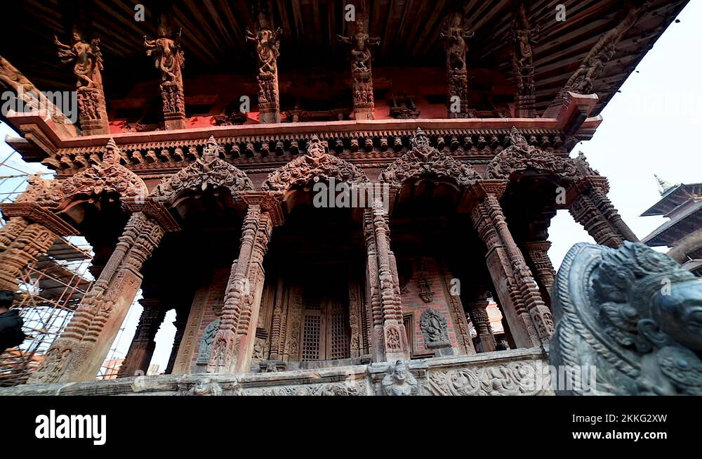 Wood Carvings on a temple. Statue and intimate postures of Gods and ...