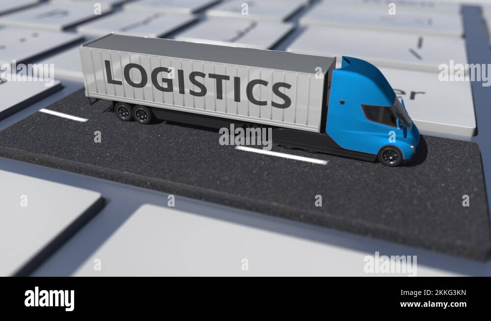 LOGISTICS text on the truck driving on the keyboard key. Conceptual ...