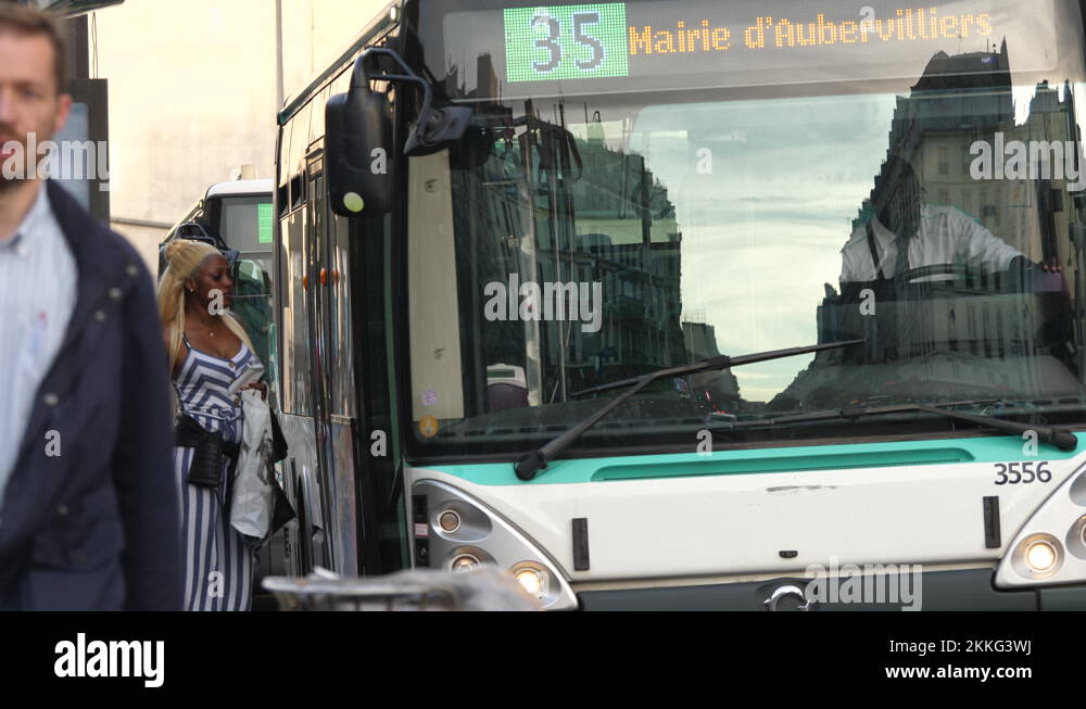 beautiful black ethnicity women entering the bus - Parisian bus station ...