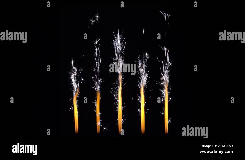 Stream of fire sparks on a dark. Festive background layout. Five cold ...