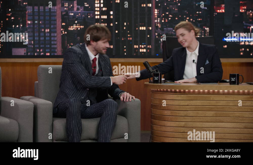 Late-night talk show female host having a conversation with celebrity ...