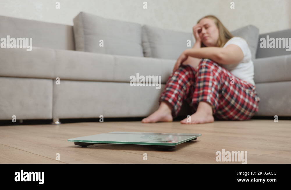Woman sad scales Stock Videos & Footage - HD and 4K Video Clips - Alamy
