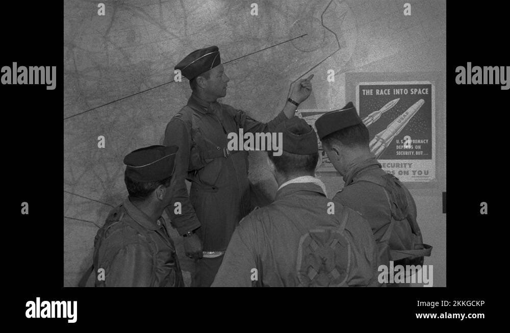 1950s: Soldiers look at map. Soldiers climb up poles Stock Video ...