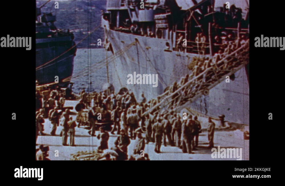 1940s: Long shot, soldiers boarding ship. Soldiers boarding ship. View ...