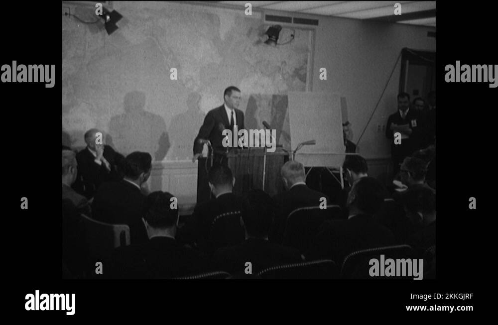 1960s: John F. Kennedy signs document. Man gives speech at podium. News ...