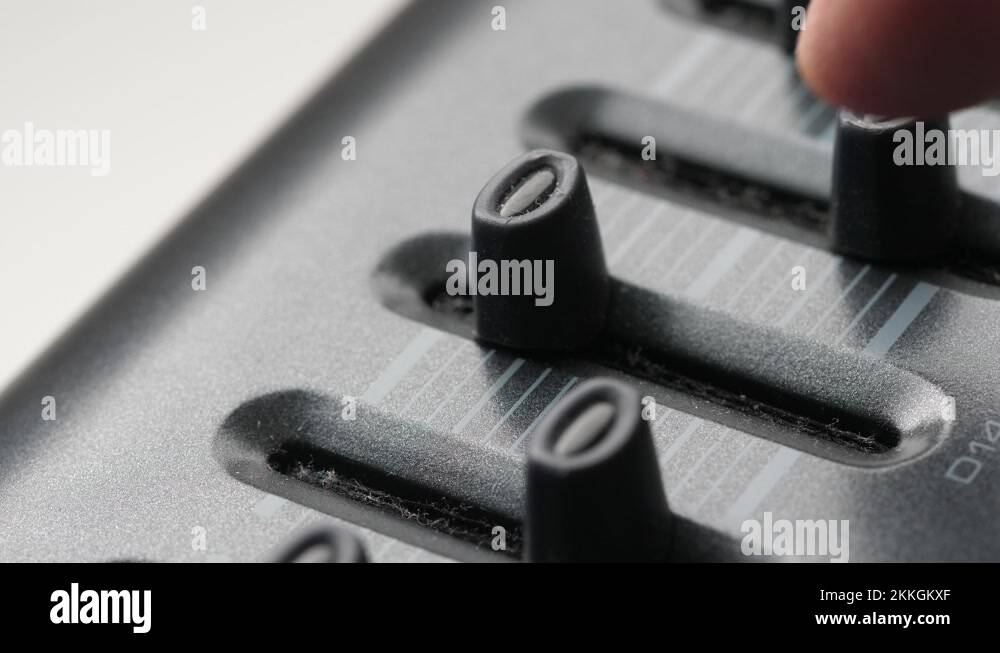 Adjusting Audio Slider on a Music Production Mixing Table Stock Video ...