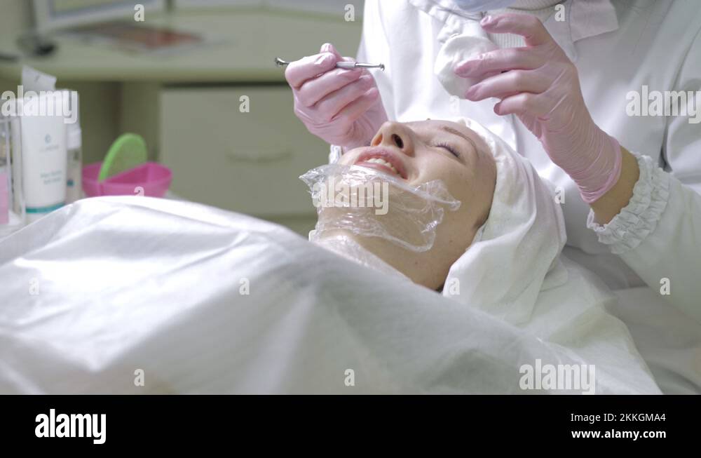 Procedure for cleaning the skin of the face with a steel appliance with ...