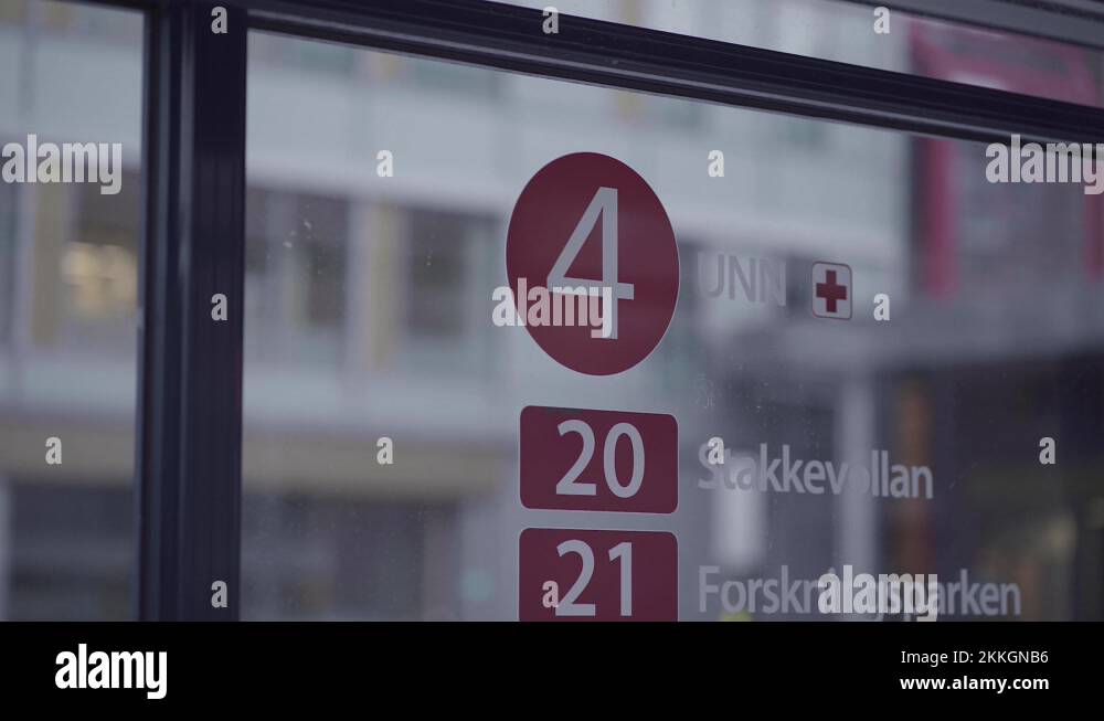 Empty Bus Stop Shelter Glass Panel Shows Routes And Numbers At Tromso ...