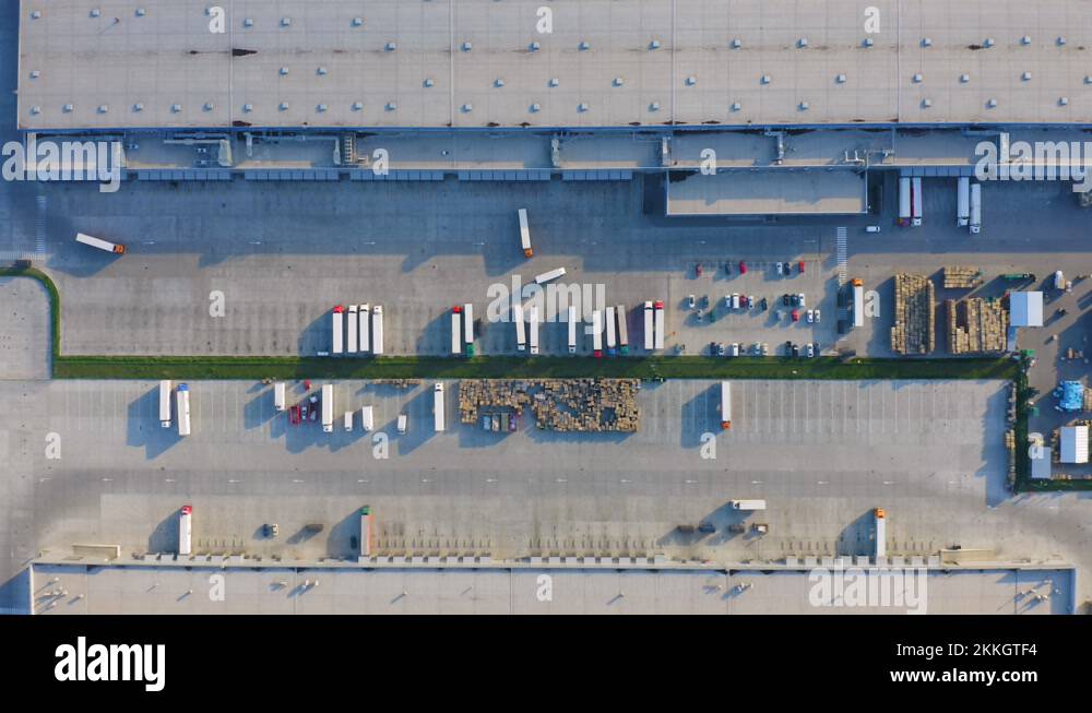 Logistics park with a loading hub. Semi-trailers trucks stand at ...