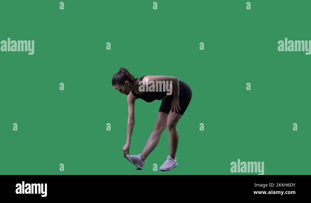 Side view of woman hamstring leg stretching exercise. Full body on ...