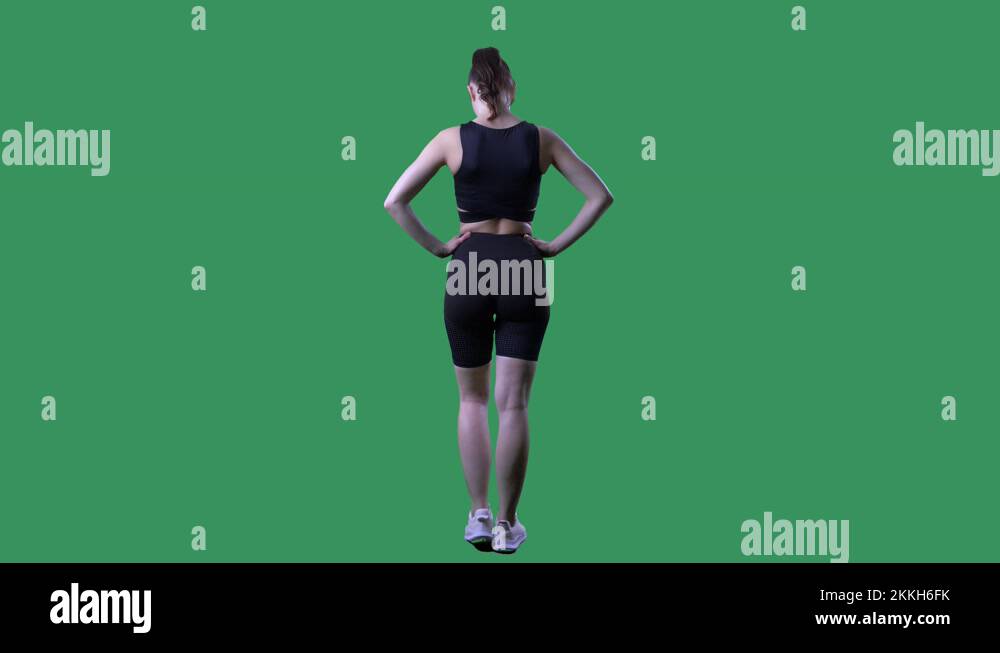 Back view of fitness woman neck stretching exercises. Full body on ...