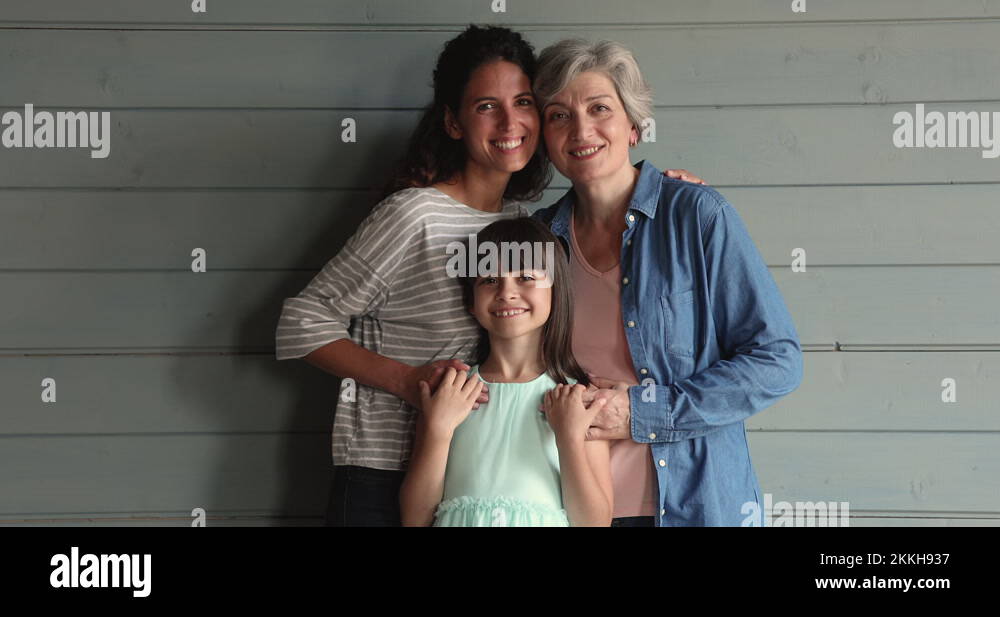 Three generation of women posing hugging in studio Stock Video Footage ...