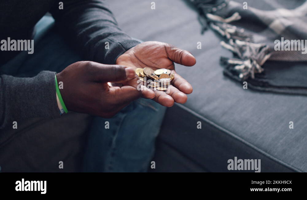 Black man counting coins. Close up on the hands of poor man Stock Video ...