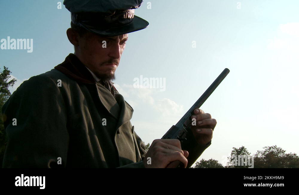 Man Loading a 19th century Black Powder Revolver - Old Western style ...