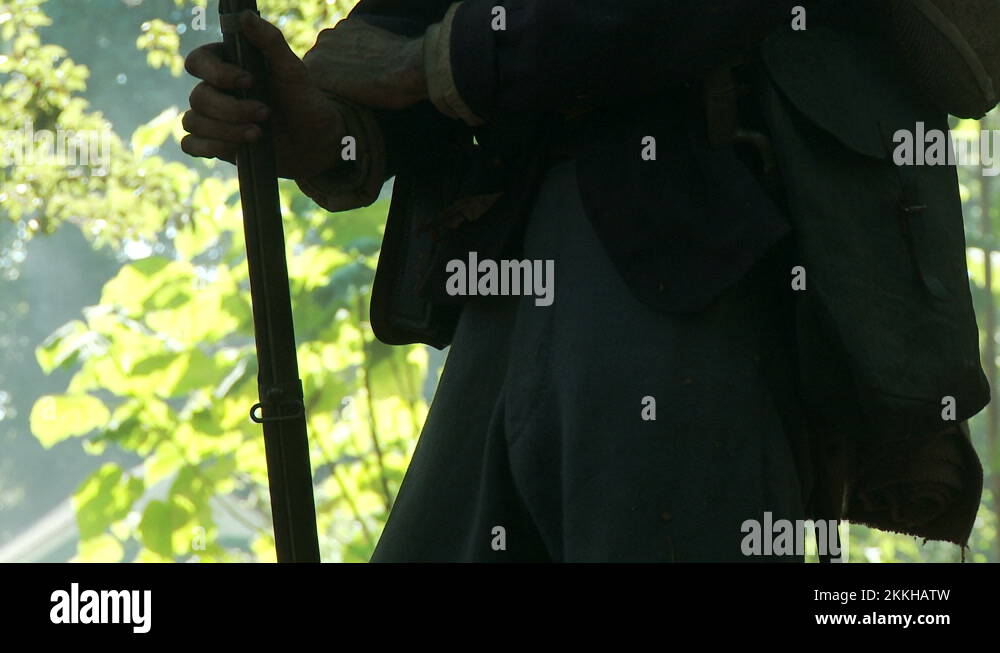 Union soldier stands in silouette with his Springfield Rifle Musket ...