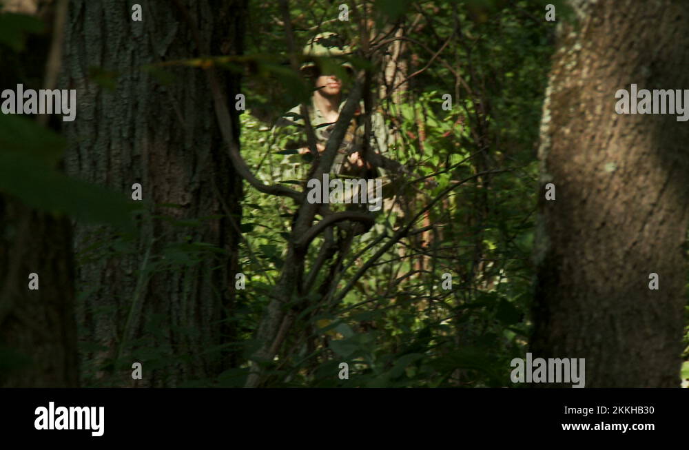 Portrayal of Soldiers, under fire - combat in Vietnam War era with M-16 ...