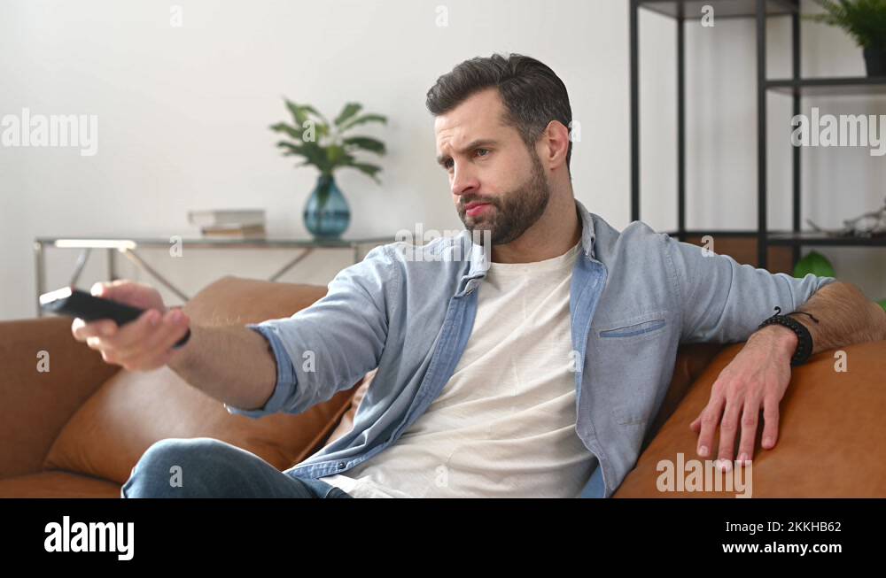 Man holding tv remote Stock Videos & Footage - HD and 4K Video Clips ...