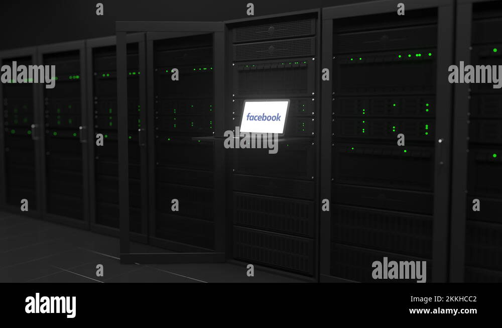 FACEBOOK logo on the screen in a modern server room. Conceptual ...