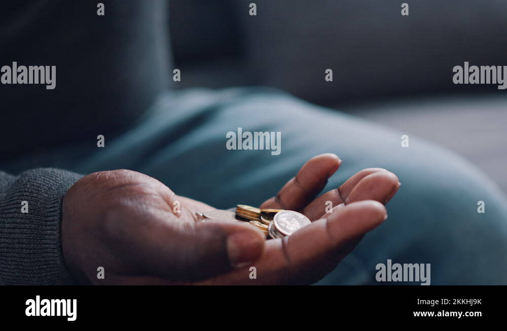 Close up hands with coins. African american black man holding coins ...