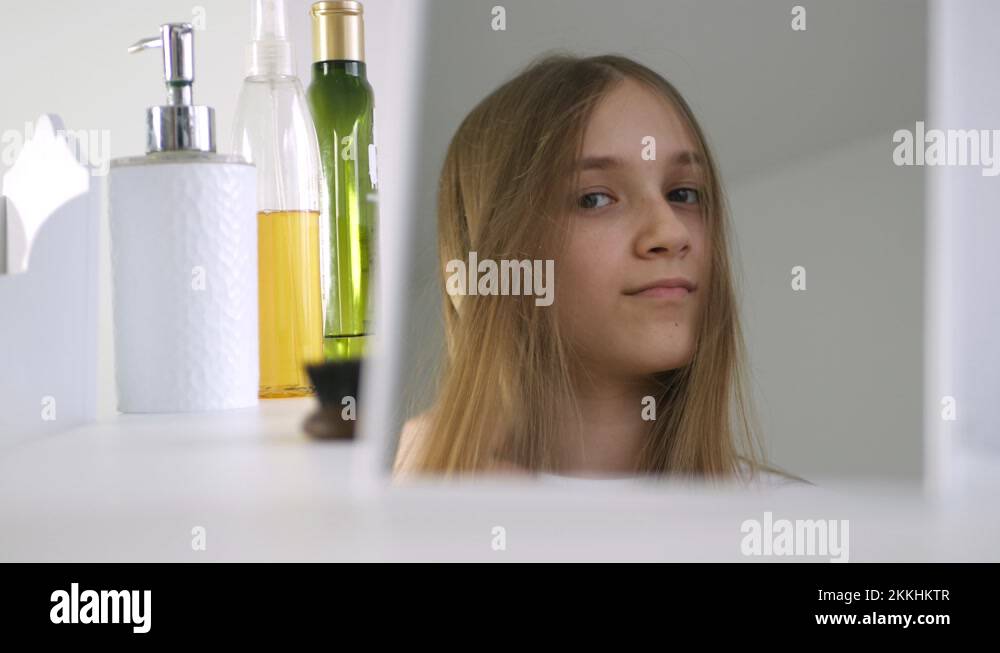 Girl brushing hair mirror Stock Videos & Footage - HD and 4K Video ...