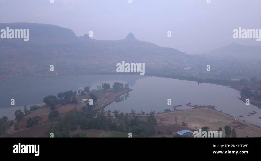 Misty Mountains With Calm Lake Near Trimbakeshwar Shiva Temple In ...