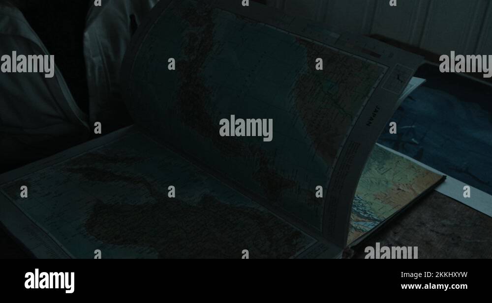 4K SLOW MOTION: Girl scrolling through map book Stock Video Footage - Alamy