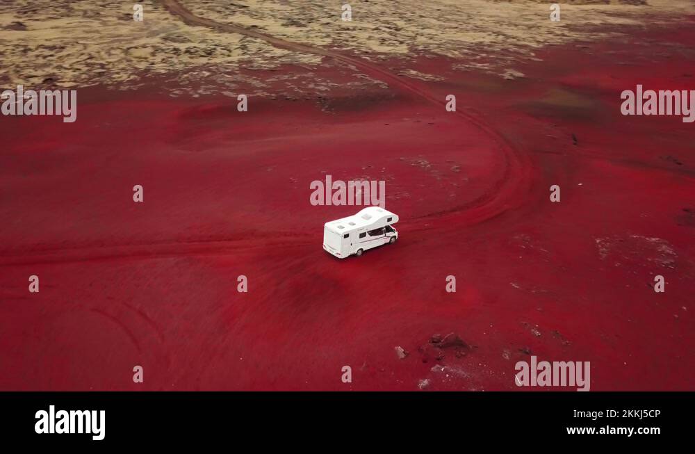Drone shot motorhome camper Camping-car amazing red road mars Iceland ...