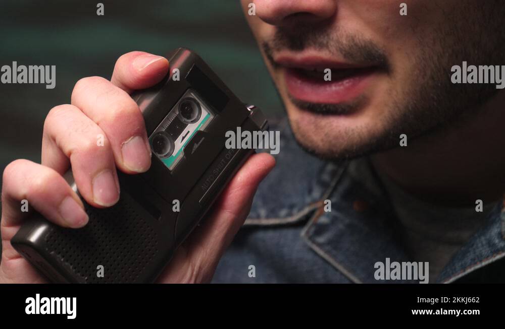 Using a Micro Cassette Dictaphone Recorder 80s 90s Stock Video Footage ...
