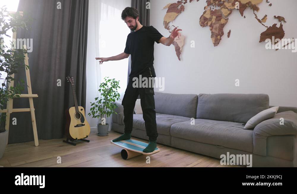 Balance board man Stock Videos & Footage - HD and 4K Video Clips - Alamy