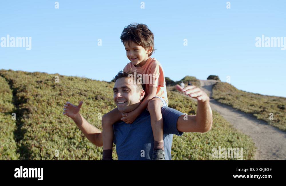 Kid on shoulders Stock Videos & Footage - HD and 4K Video Clips - Alamy