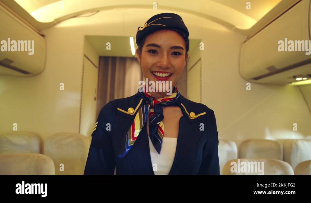 Cabin crew or air hostess working in airplane Stock Video Footage - Alamy