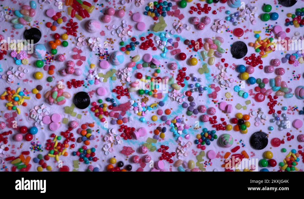 Large round table of mixed sweets, different colors and shapes, for all ...