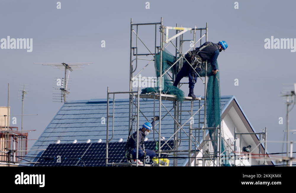 Japanese Construction Workers Working And Putting Safety Net On Stock ...