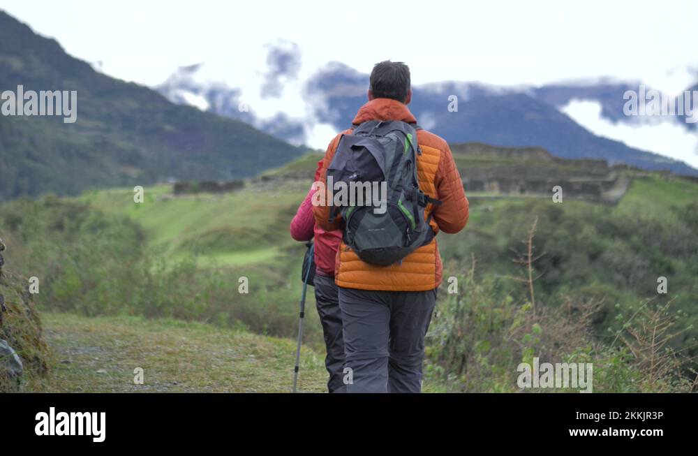 Couple walking road to archaeological place of the inca culture, the ...