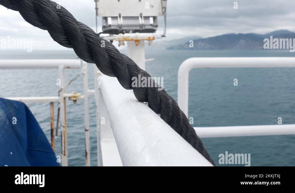 A tight rope moves with tension while the Interislander ferry boat ...