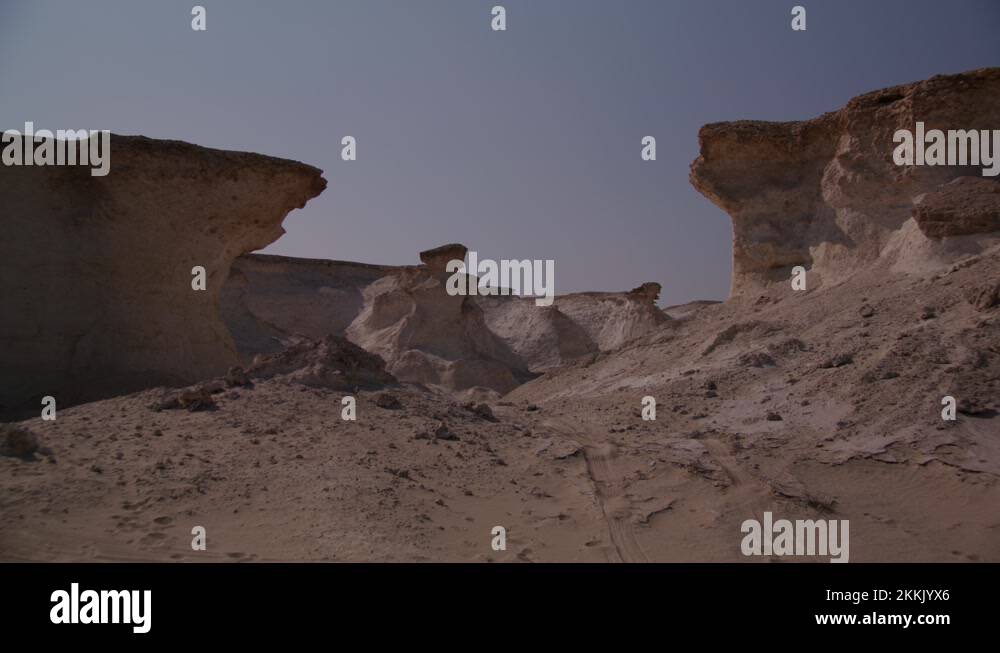 Camera sliding from left to right showing the rocky area in Zekreet ...