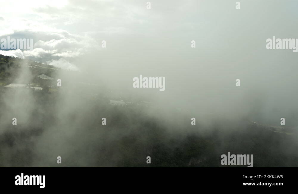 High Elevation Aerial: Long Valley Sprawls Into Distance Between Lush ...