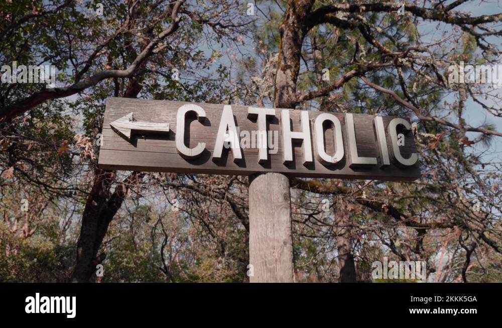 Wooden Cemetery Sign Pointing To Catholic Section of Graveyard - 4K ...